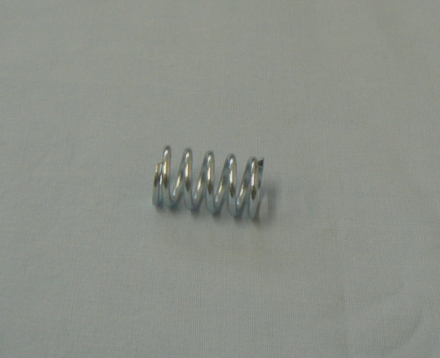 A111B6004F (111B6004) SPRING for DRIVING LAMP MOUNTING SCREWS